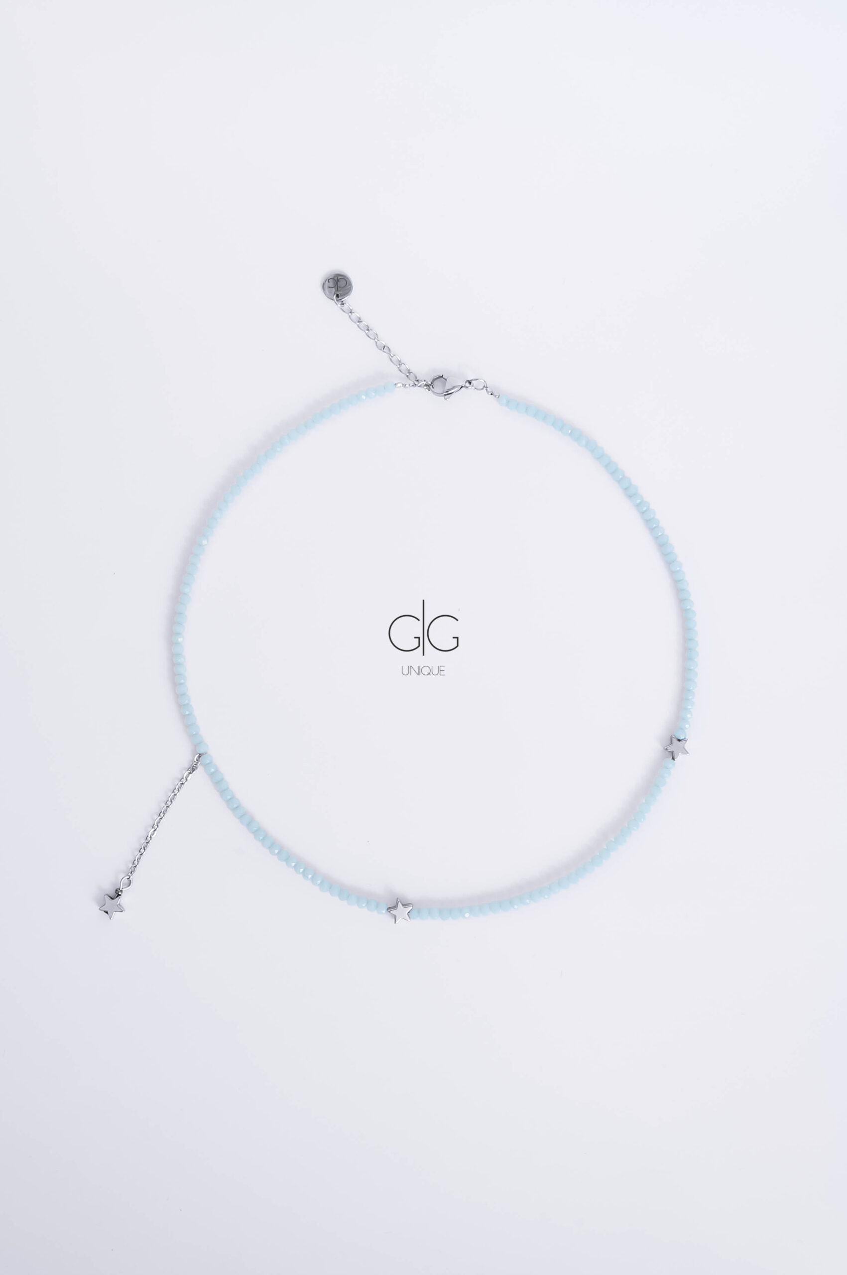 Light blue crystals star necklace
